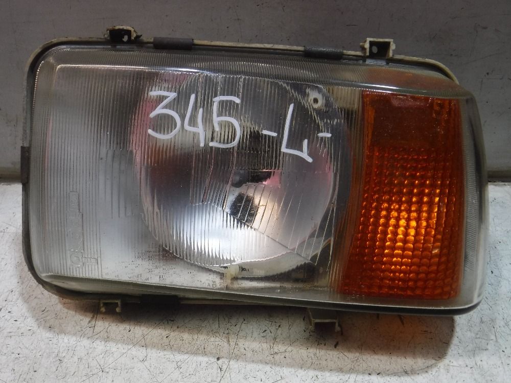 Фара левая Volvo 340