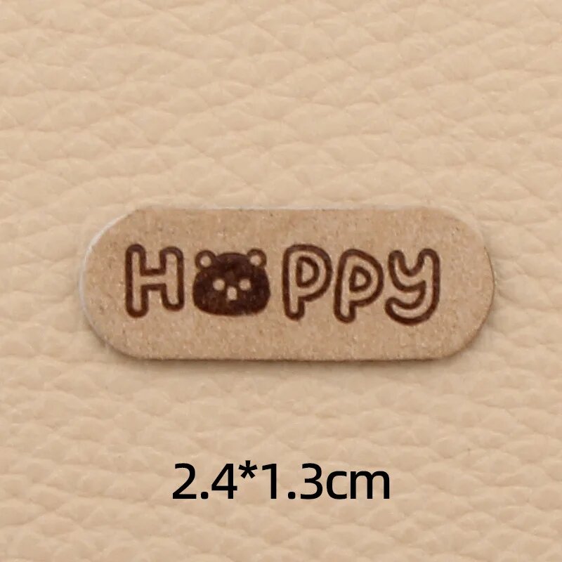Кожаные нашивки "Happy" бежевые, 5шт, 2.4*1.3см