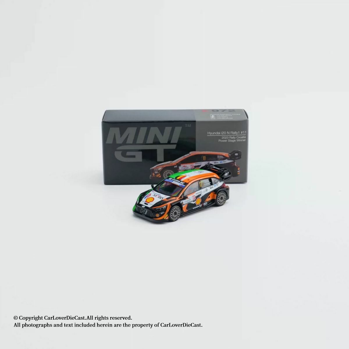 Машинка MINI GT MODEL 1:64 #972 Hyundai i20N rally car - black and orange Die-cast Alloy Model Collection Toy Children Gifts