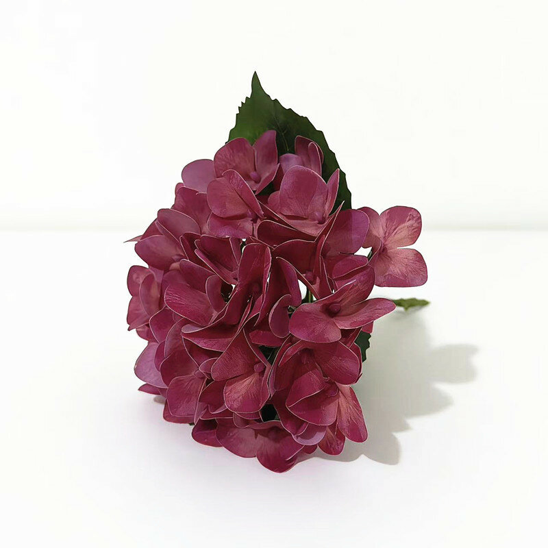 Silk hydrangea flower stem for home decor and photography studio use, rose red