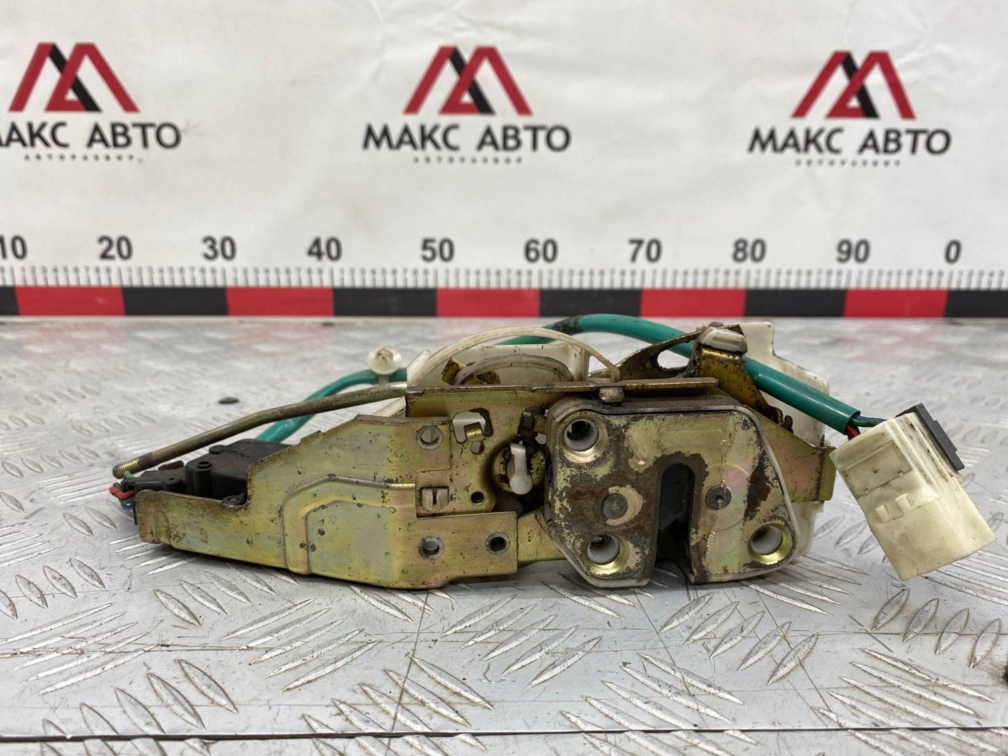 Замок двери передний левый. MAZDA DEMIO, I (DW) 1999 B3 1.3L Хэтчбек 5 дв. серый