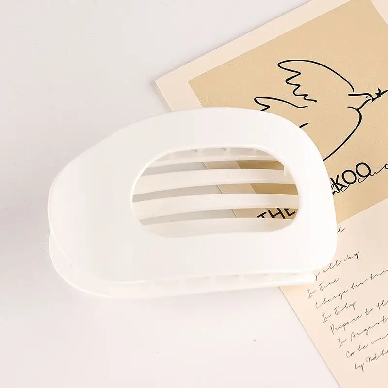 Пластиковый круглый зажим для волос «Утхонос» 1pc white