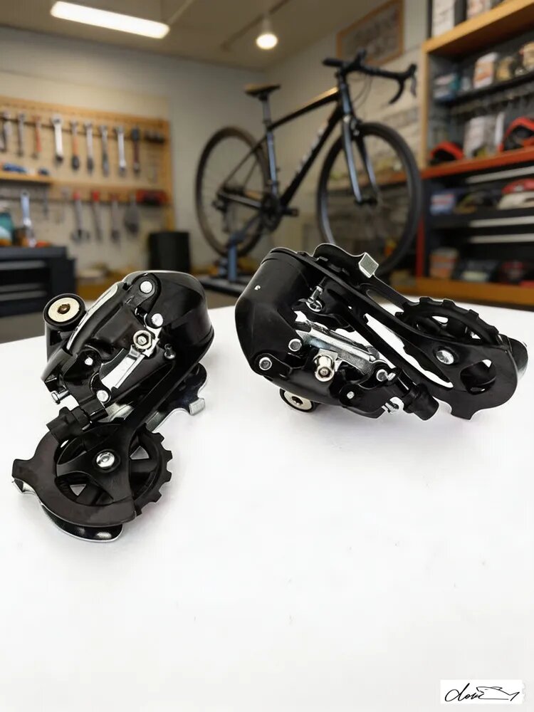 Задний переключатель Shimano Altus RD-M310 для велосипеда, 7-8 скоростей, черный — фото 1