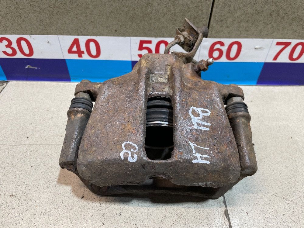 Суппорт передний левый VW Passat B4