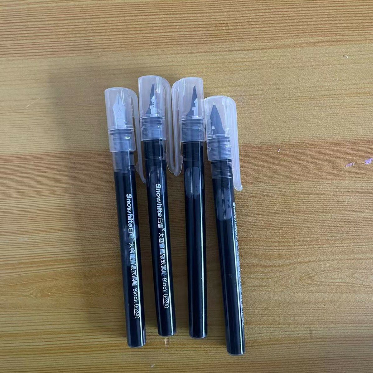 Bai Xue Одноразовая перьевая ручка с кончиком EF 0.38 мм для школьников без замены картриджа 4 шт. классический черный