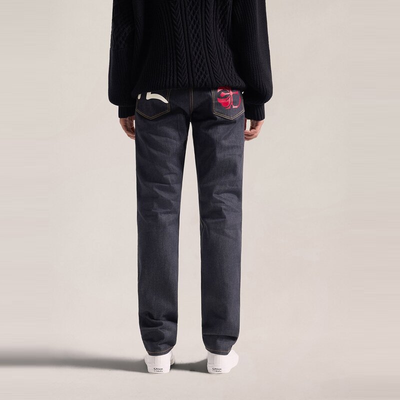 Джинсы зауженные Evisu