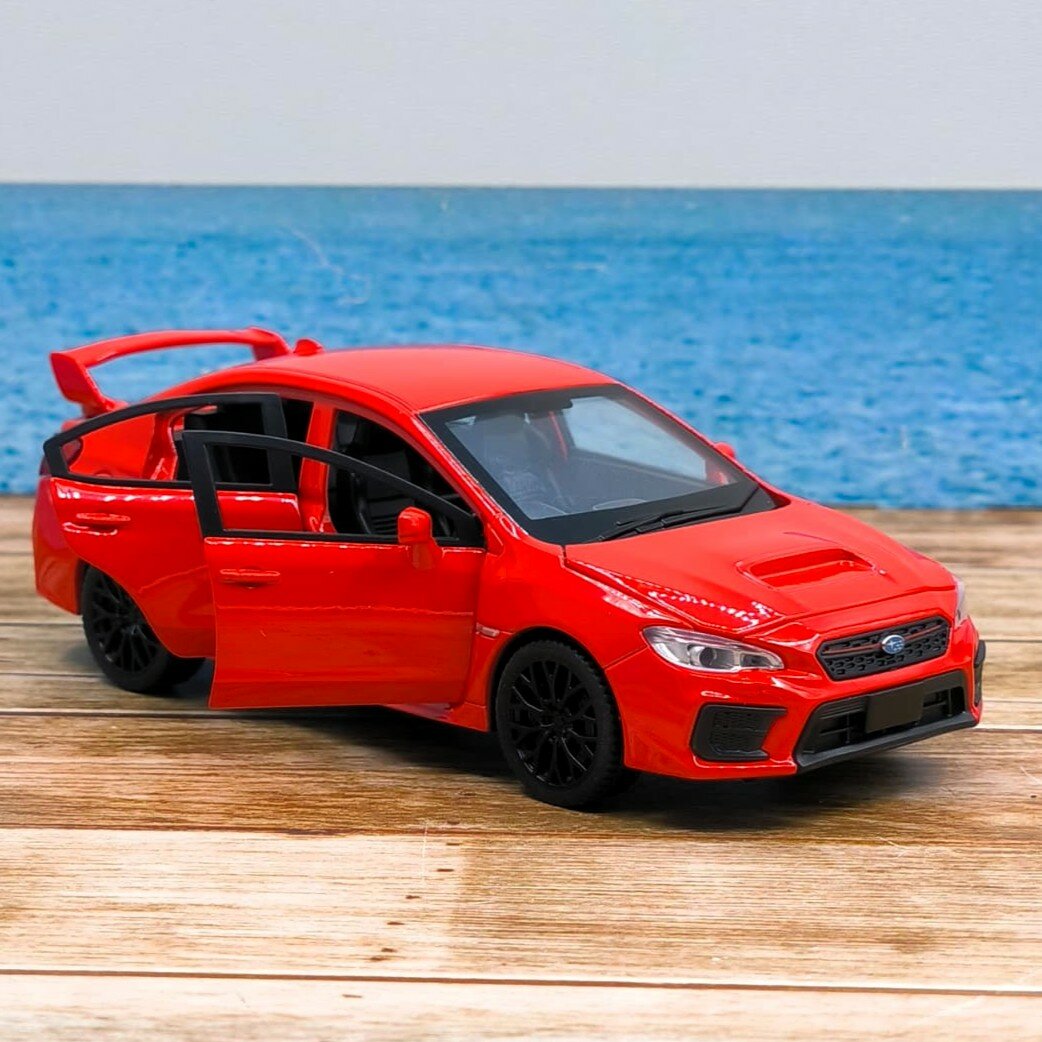Металлическая модель машины Subaru Impreza WRX STI с световым и звуковым сопровождением. Масштаб 1:32
