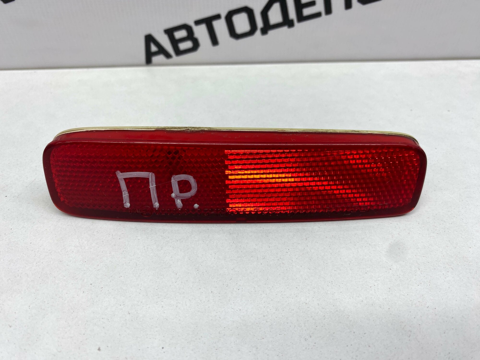 Катафот в бампер задний Nissan Cube Z10 2001 г