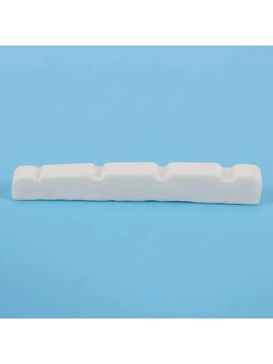 Порожек из изогнутой кости с прорезями совместим 4 x струн PB Precision, 4, 2X3, 2X4, 6 / 4, 6 мм