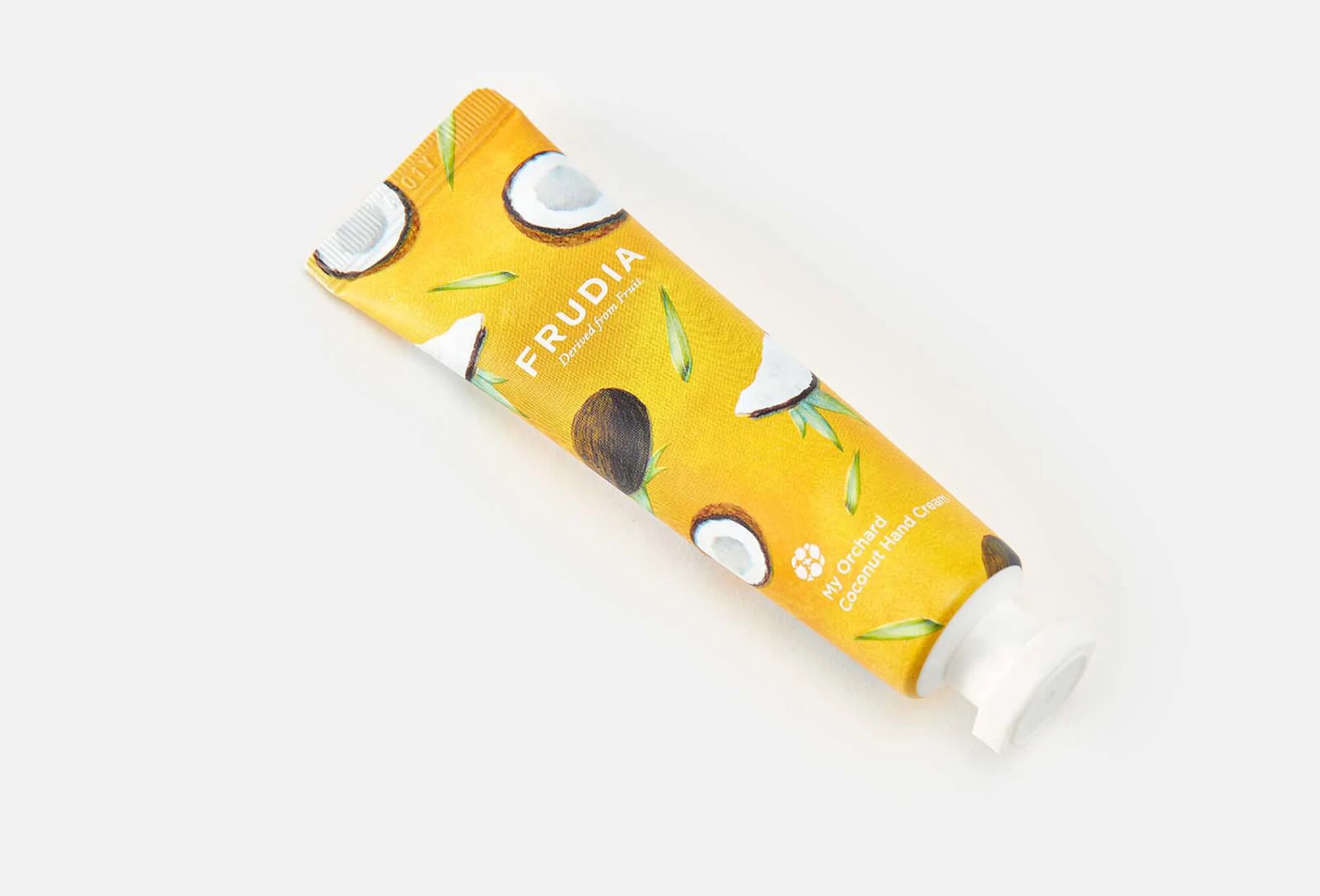 Крем для рук FRUDIA Squeeze Therapy Coconut 30 г дарит мягкость.