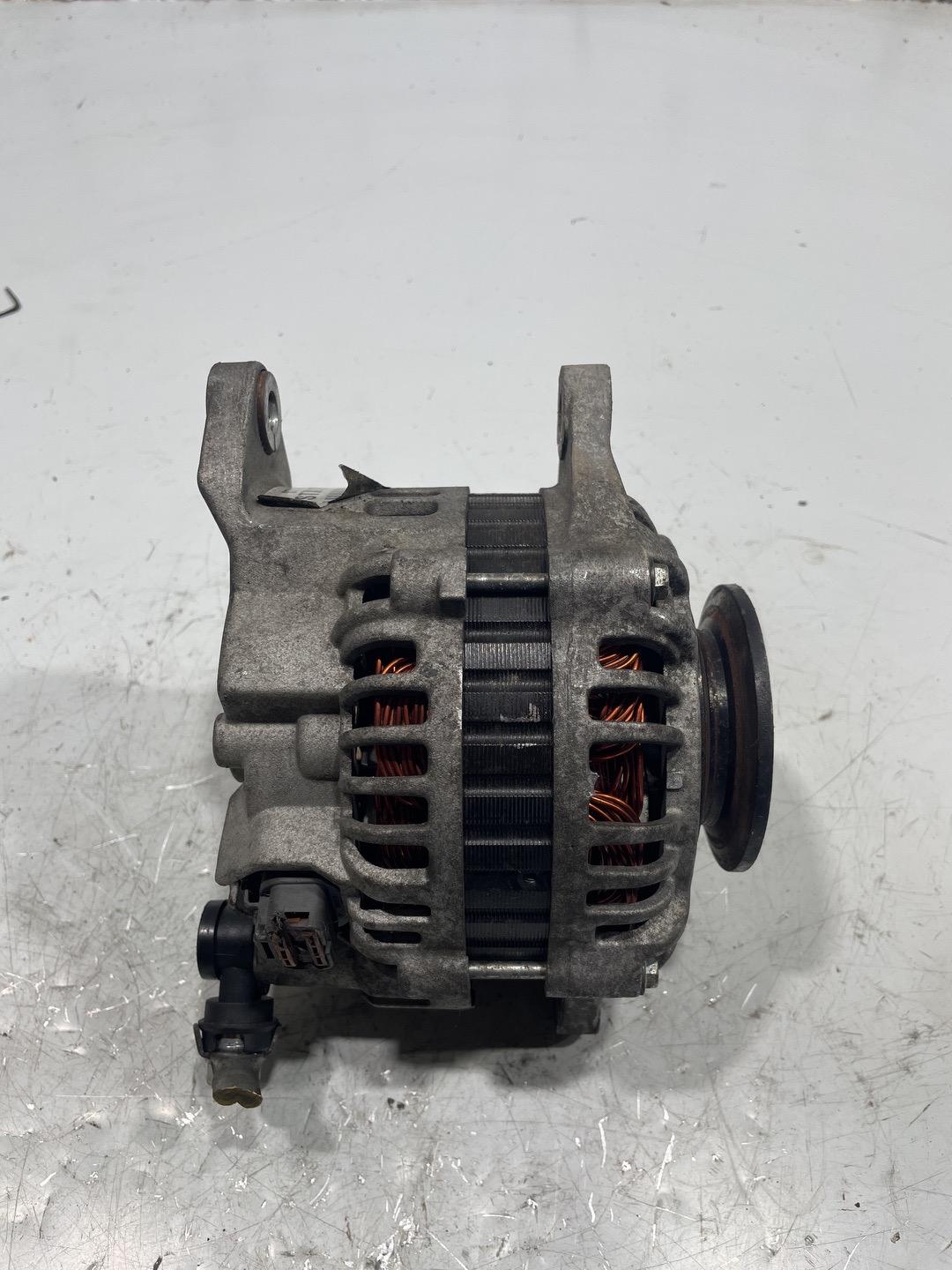 Генератор Nissan Almera N16 (2000 - 2003) STX100511