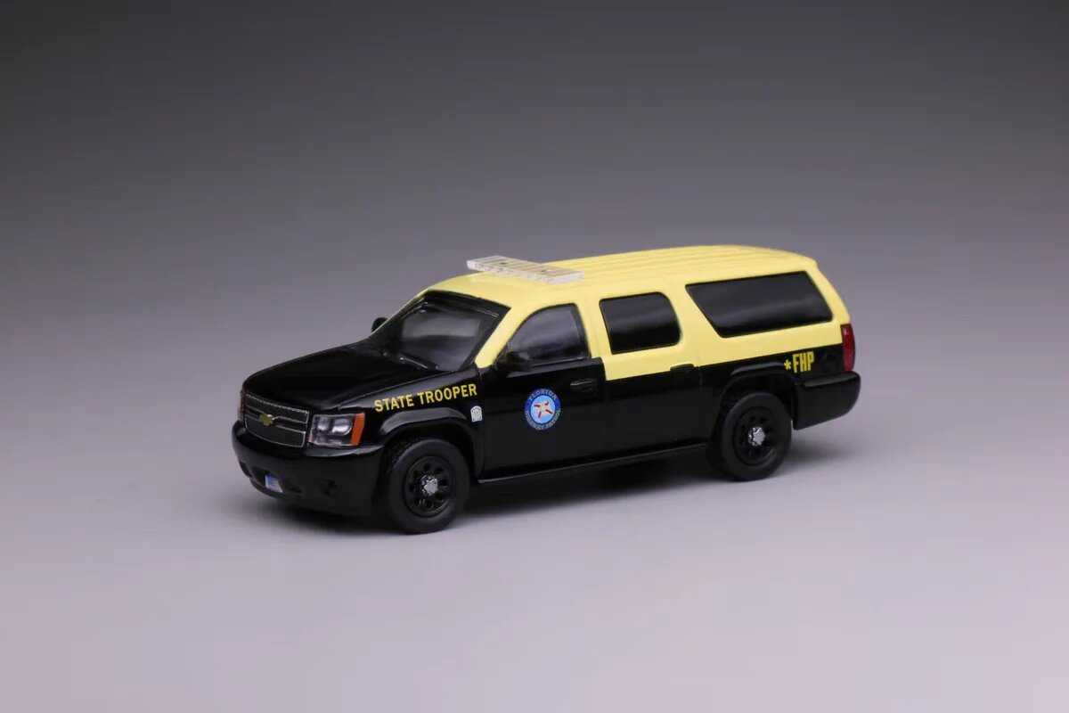 Модель автомобиля Chevrolet Tahoe State Trooper 1/64, черный и желтый