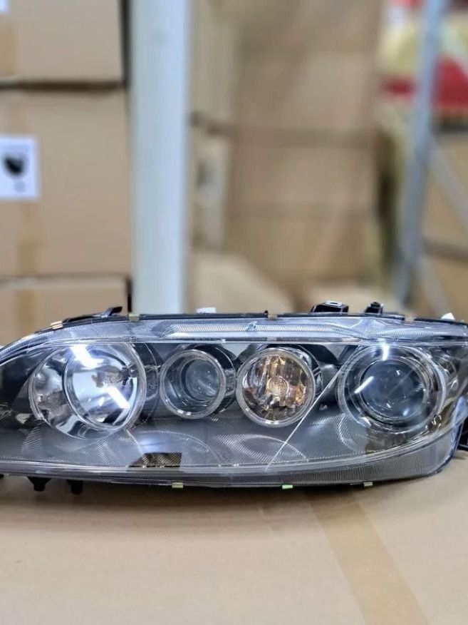 Фара левая MAZDA 6 GG 05-08 с корректором/с ПТФ