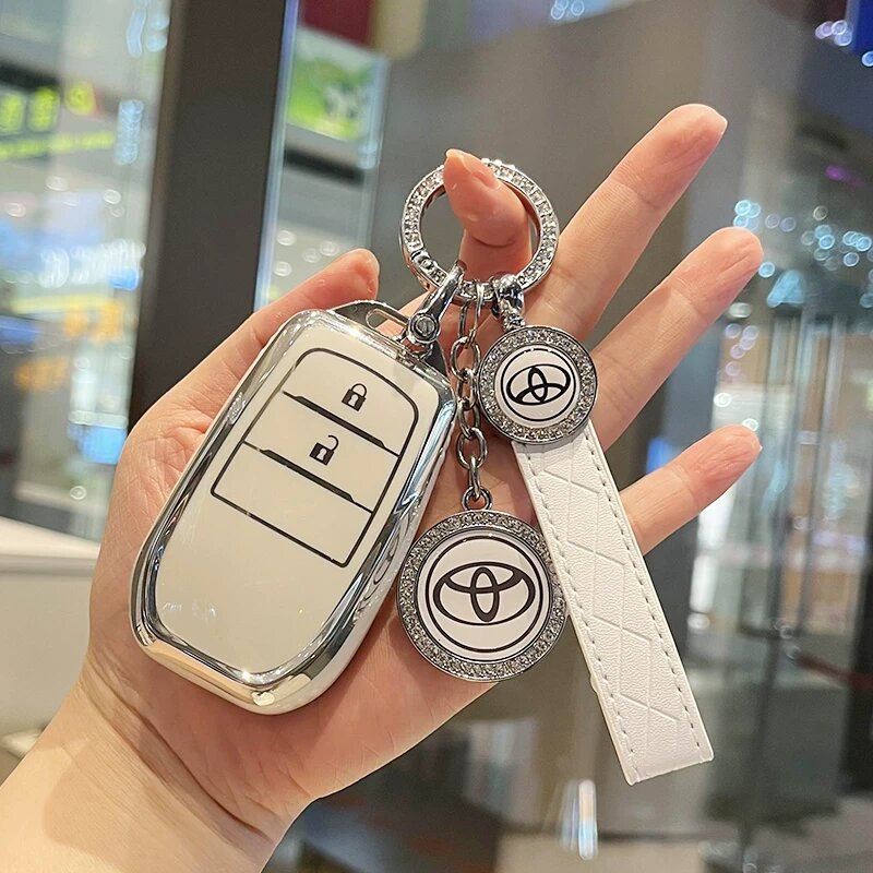 2-Кнопочный чехол для ключа Toyota Corolla Cross белого цвета с автомобильной цепью и автомобильным ремнем