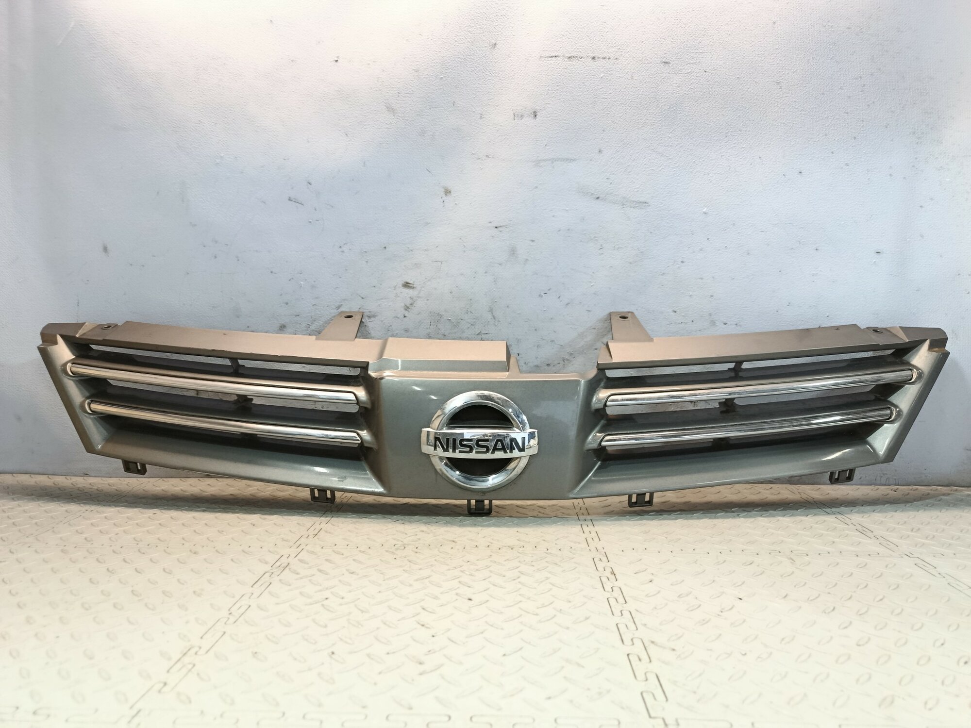 Решетка радиатора Nissan 62310WE000 S4177Z