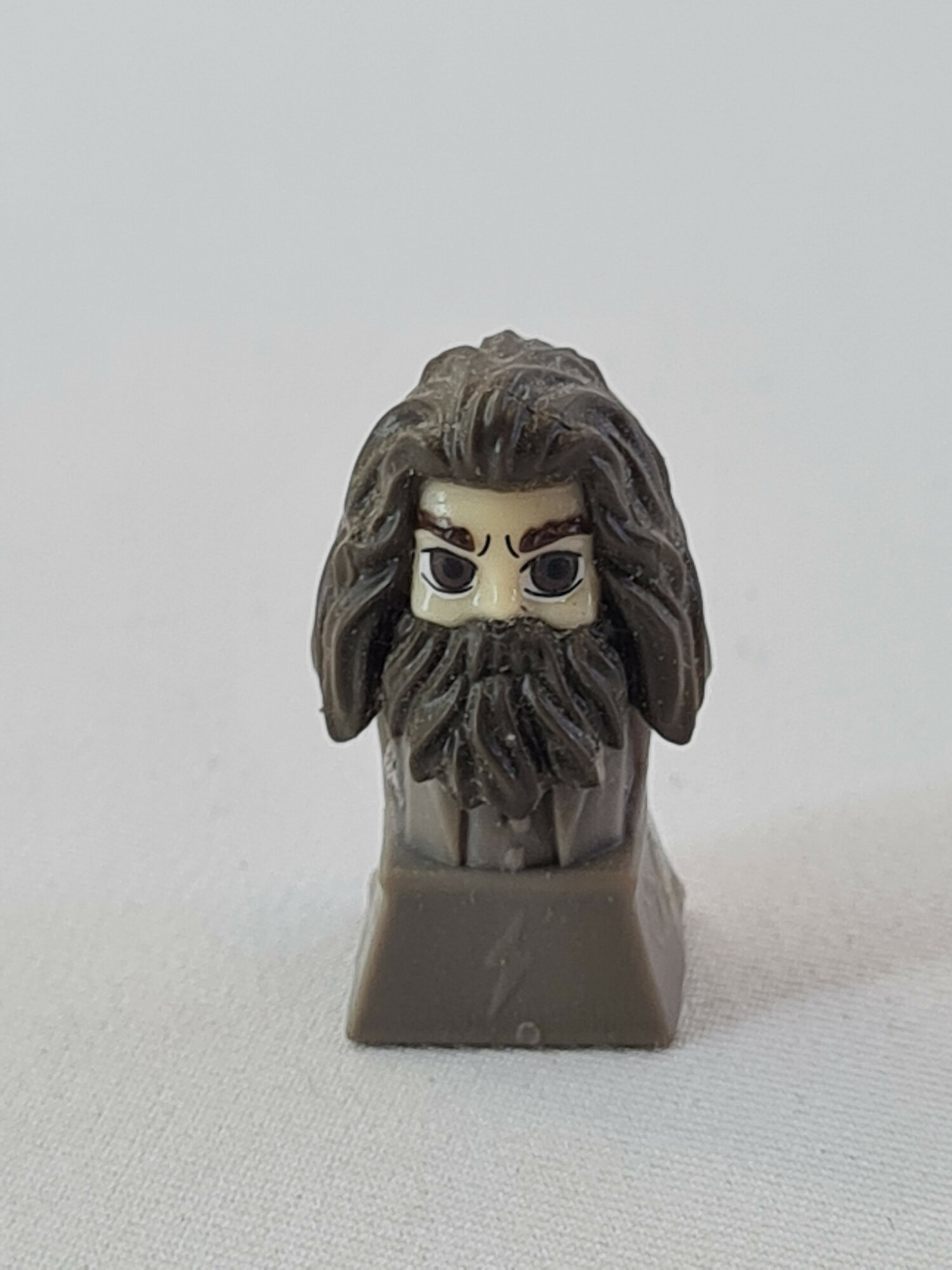 Винтажная игрушка СССР. Пластмассовая фигурка бородатого мужчины в сером одеянии для коллекции