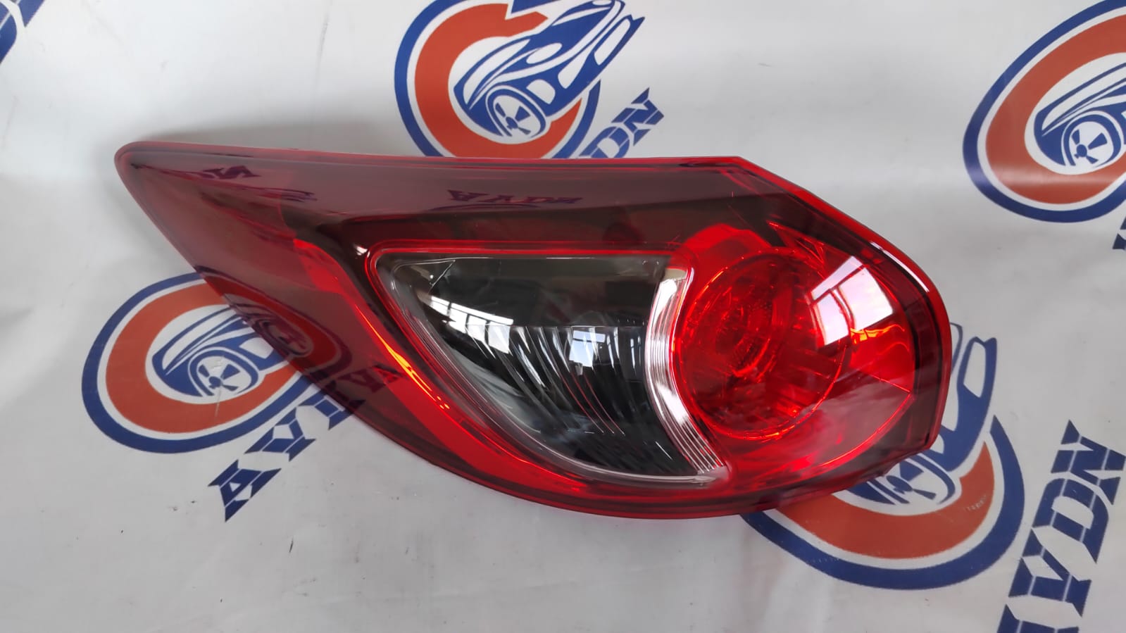 Фонарь левый внешний MAZDA CX-5 11-15