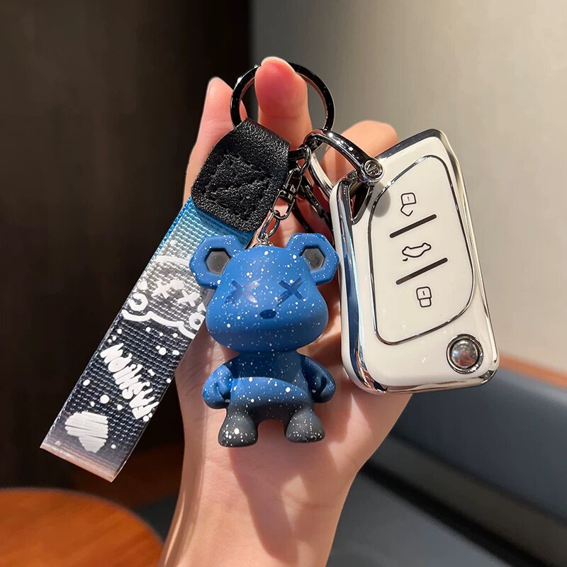 Кастомизированный складной ключевой чехол для Mitsubishi Lancer с однотонной белой оболочкой и синим медвежьим подвесом