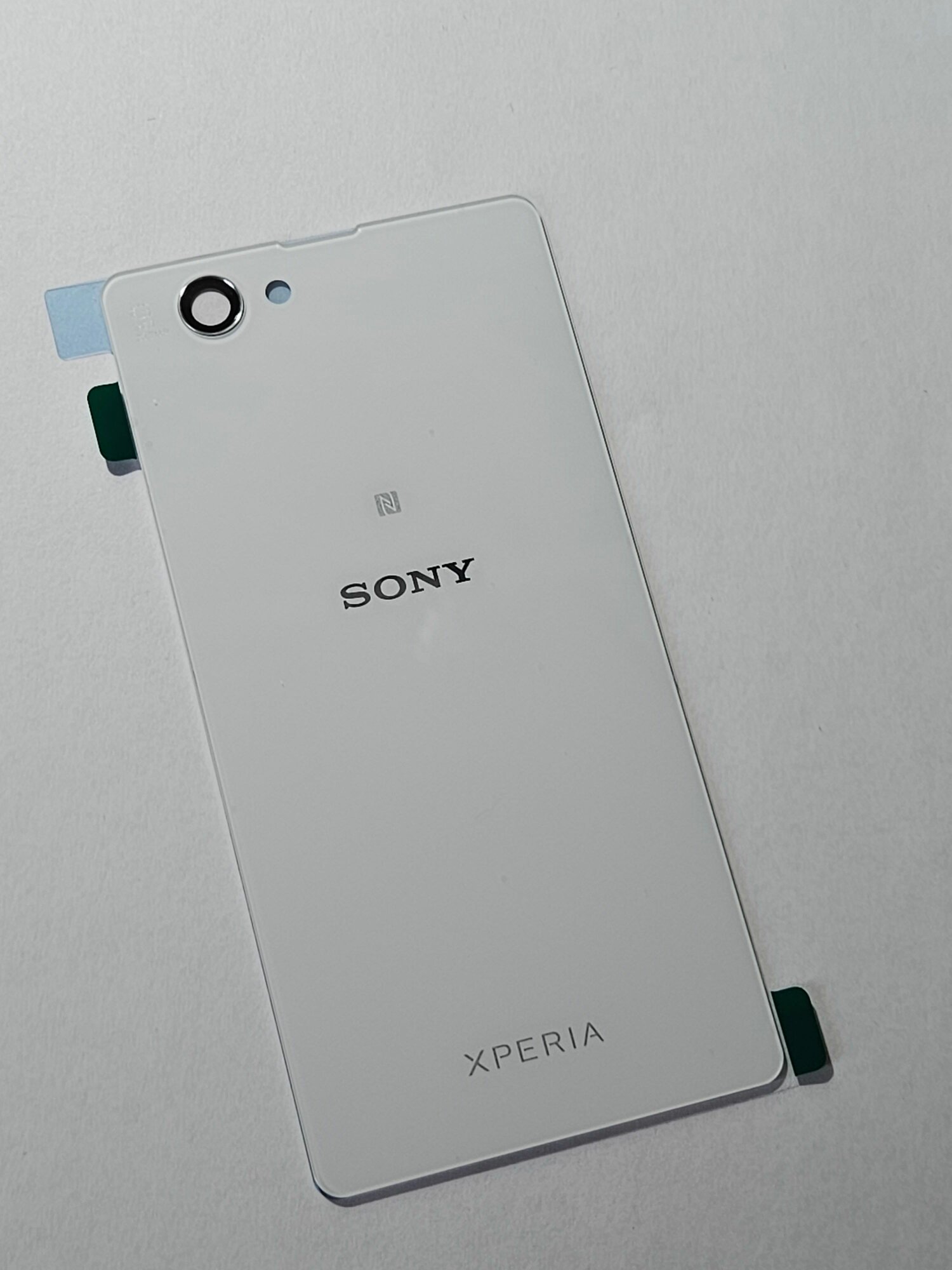 Крышка аккумулятора для Sony D5503 Xperia Z1 Compact (цвет - white ) с липким слоем парт. номер 1276-8465, оригинал