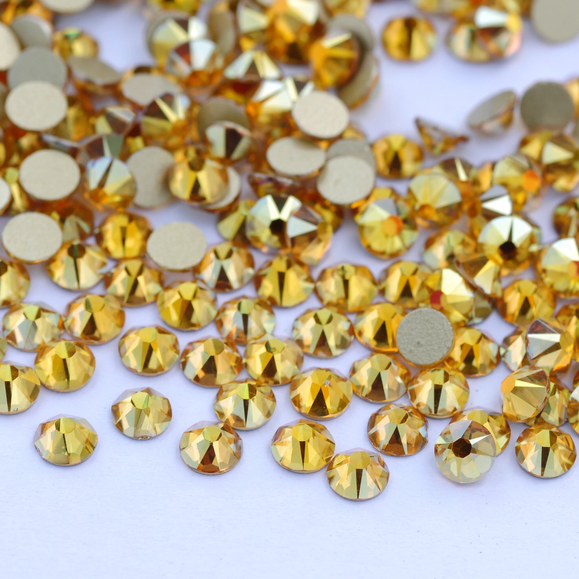 Стразы Topaz и Topaz AB для декорирования SS30 288pcs, Topaz AB