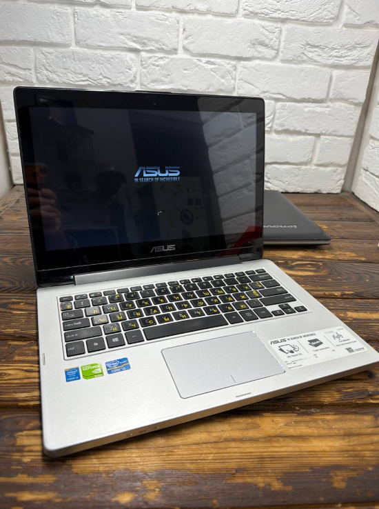 Ноутбук Asus TP300L Intel Core i5-5200U 2.20Ghz, RAM 8 гб, HDD 1000 гб, GeForce 920M, черный/серебристый, win8