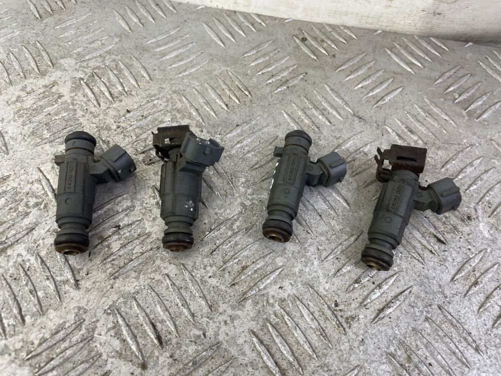 Форсунки топливные 0k2N313250 Kia Spectra Б/У с пробегом