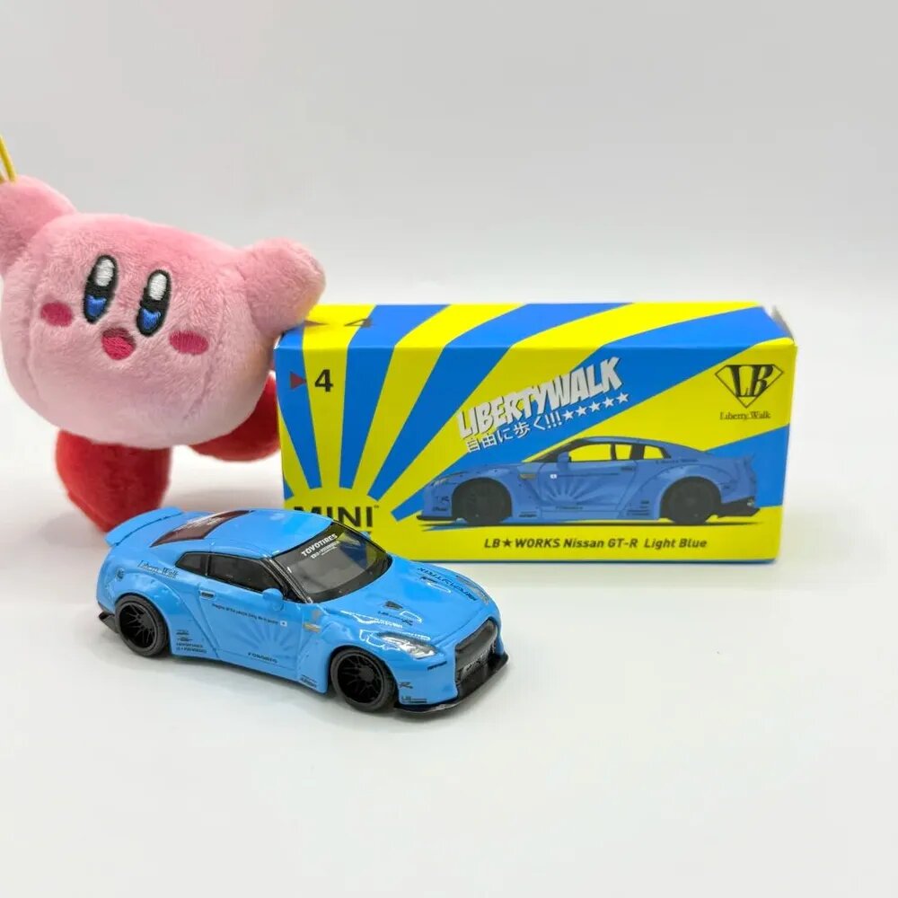 Машинка Mini gt #4 Nissan LB WORKS GT-R Light Blue