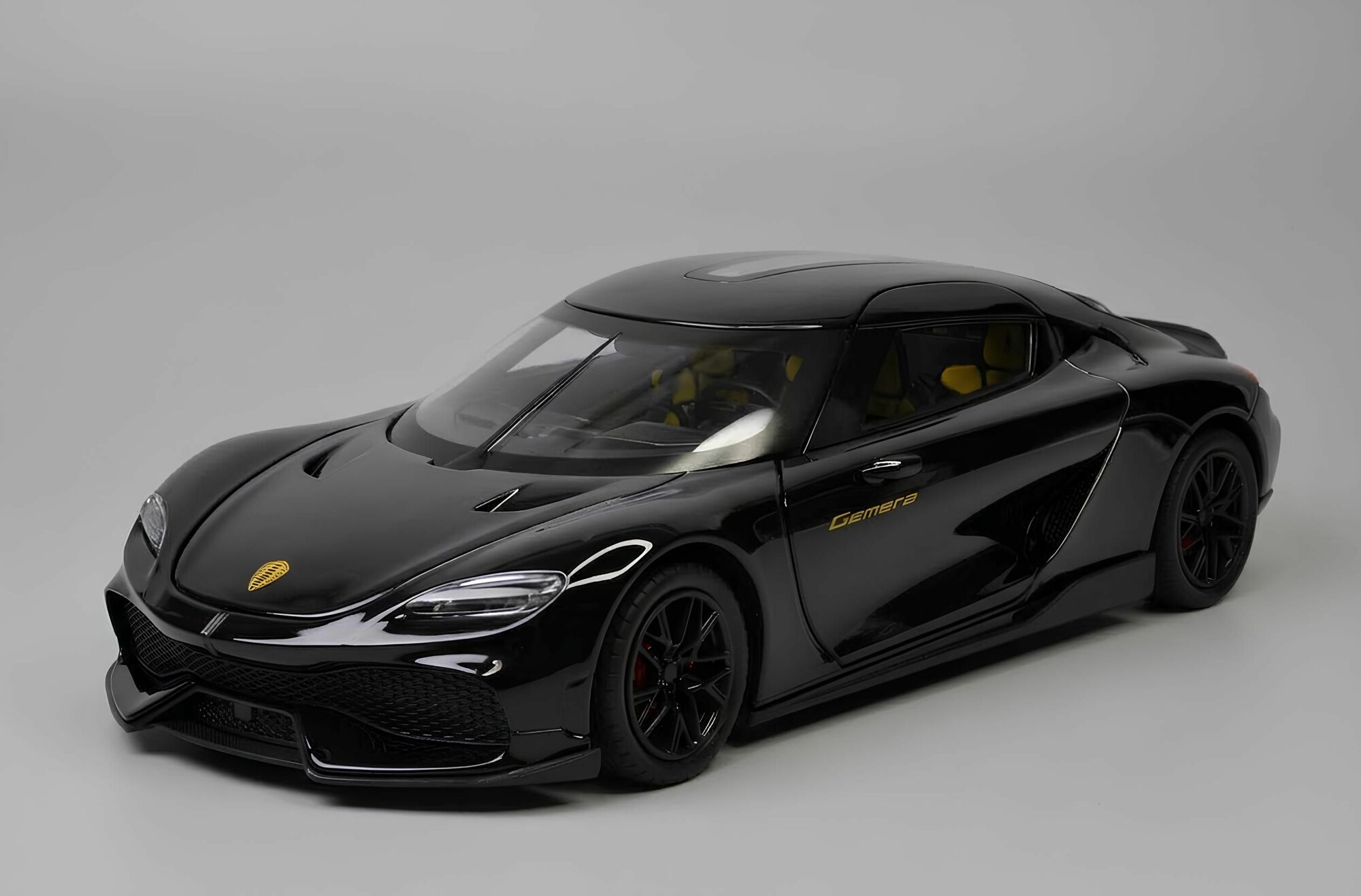 Машинка металлическая инерционная модель Koenigsegg Gemera (Кенигсегг Гемера черный21см). Инерционная игрушка машина 1:24