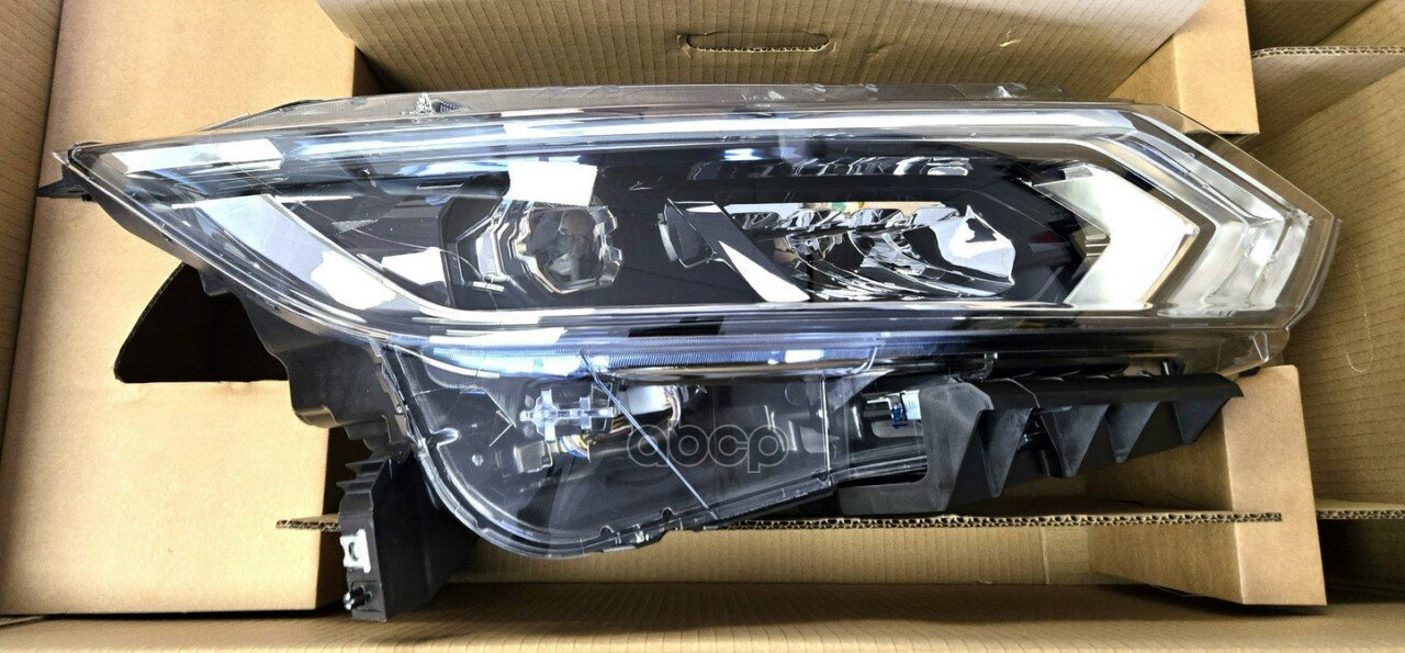Фара головного света (пластик) NISSAN арт. 26010HV05B