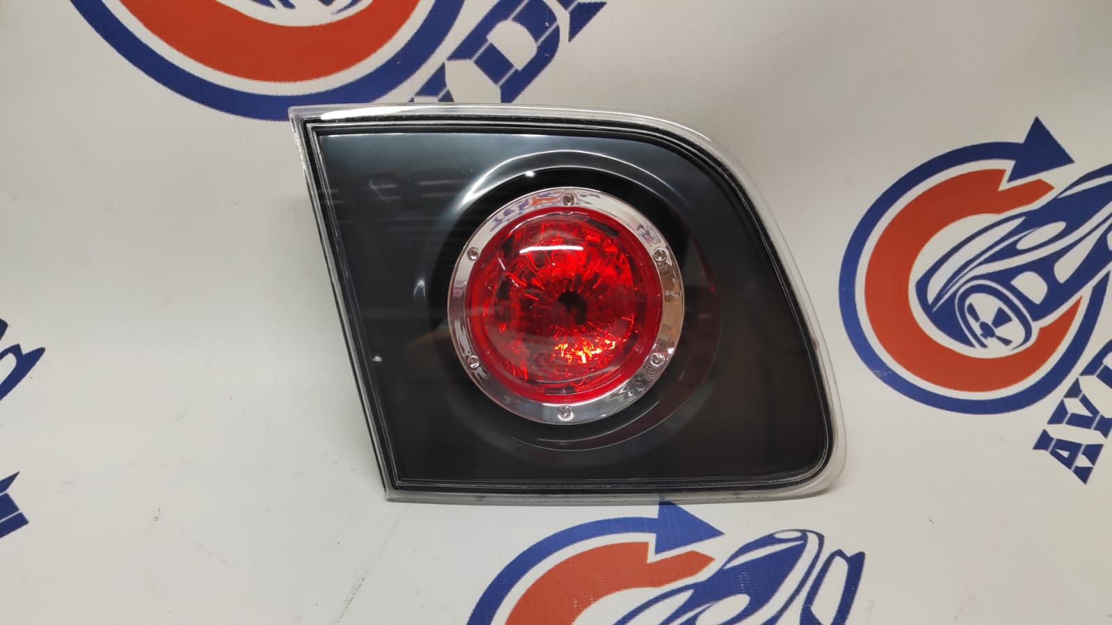 Фонарь левый внутренний MAZDA 3 BK 04-09 SDN