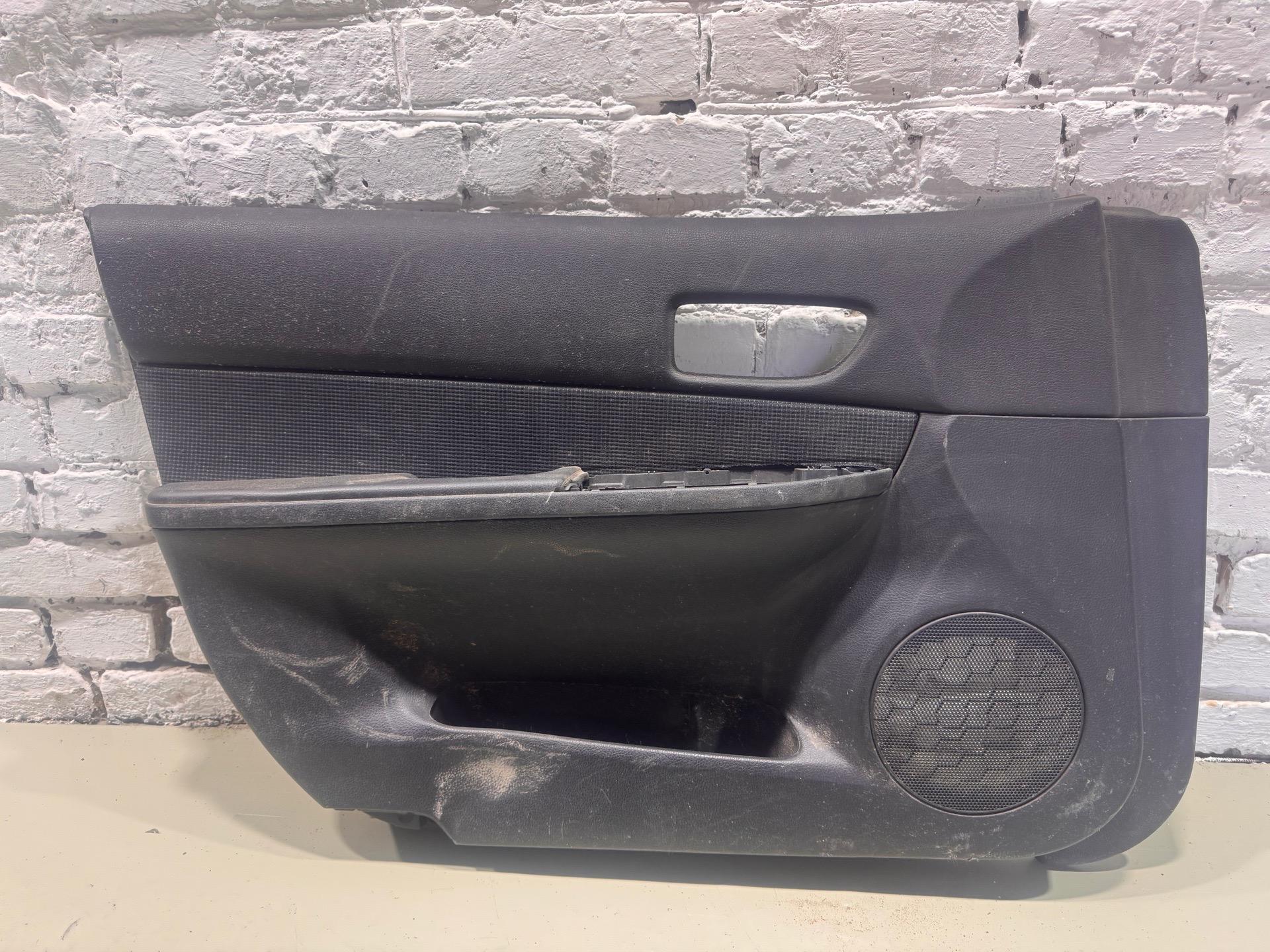 Обшивка двери передней левой Mazda 6 1 (2002 - 2005) GR1B68450K02