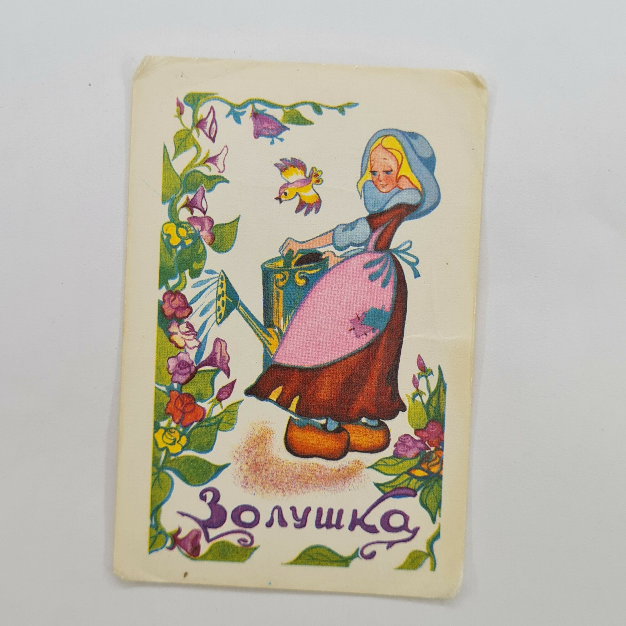 Карманный календарик 1984. Золушка с цветами и птицей. Календарь винтажный
