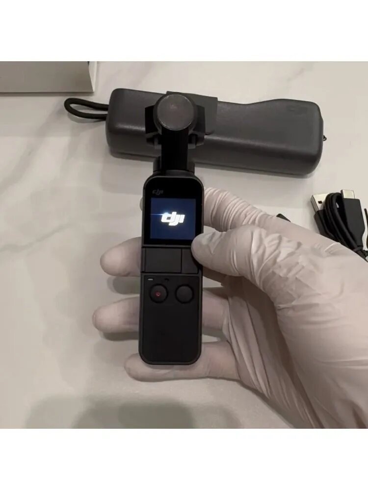 DJI Osmo Pocket 1 -ручной стабилизатор с 3-осевым подвесом и встроенной камерой