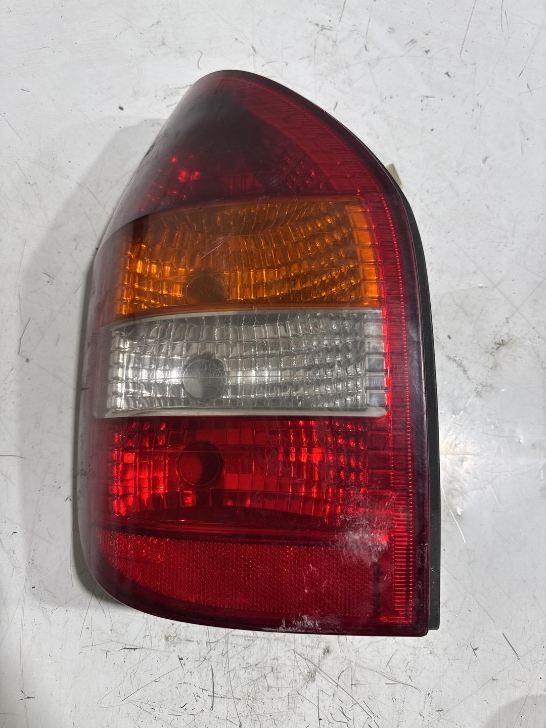 Фонарь задний левый Opel Zafira A (1999 - 2003) 9117444