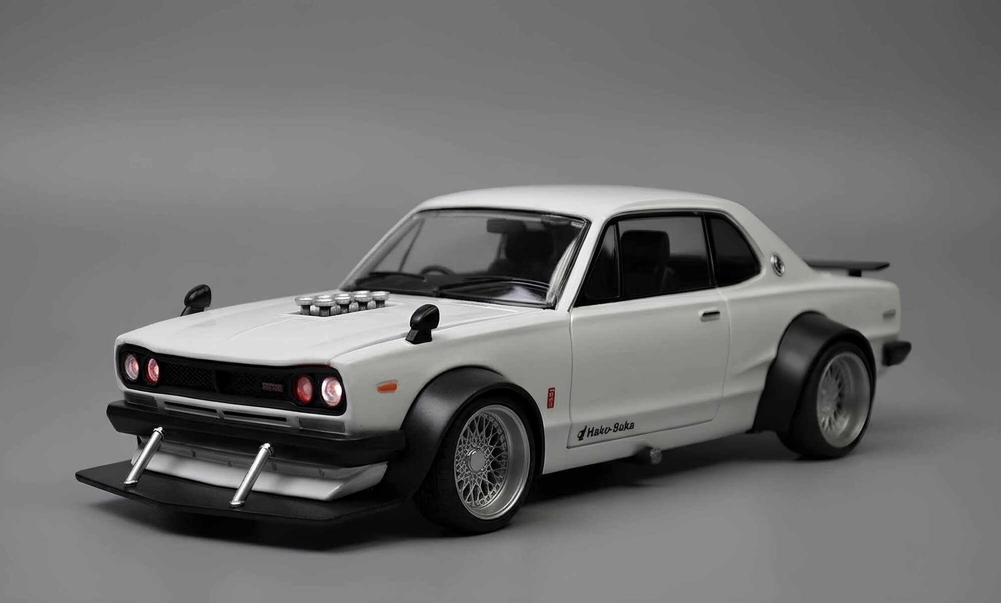 Машинка металлическая модель Японское двухдверное купе Nissan Skyline 2000 GT-R / Ниссан (1970-1972) / Масштаб 1:24