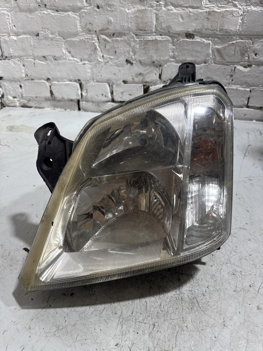 Фара левая Opel Meriva A (2002 - 2006) 93321052