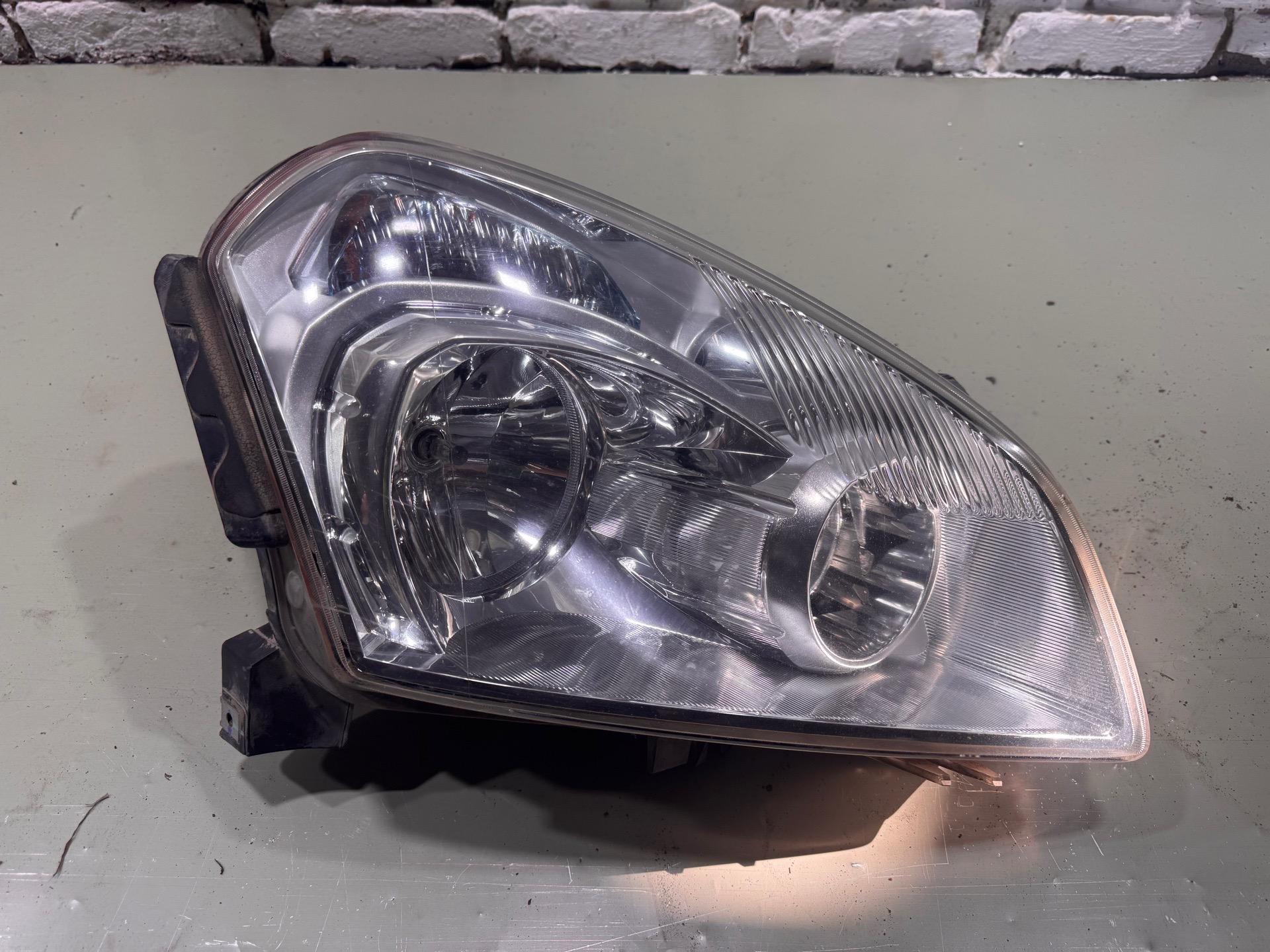 Фара правая Nissan Qashqai J10 (2006 - 2010) 26010JE20AG1