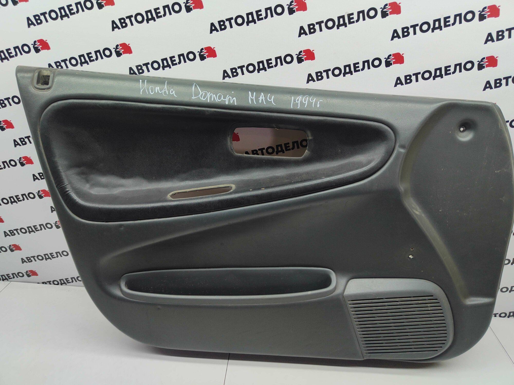 Обшивка двери передняя левая Honda Domani MA4