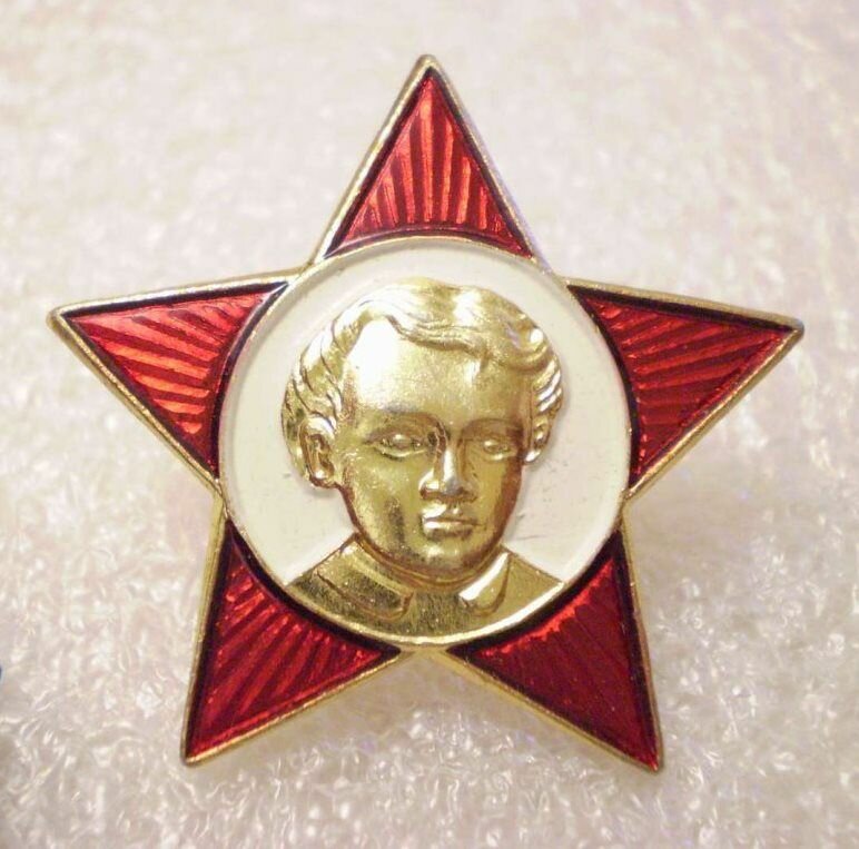 Значок Октябренок СССР. Звёздочка с юным Ильичем Лениным. Оригинал. — фото 1