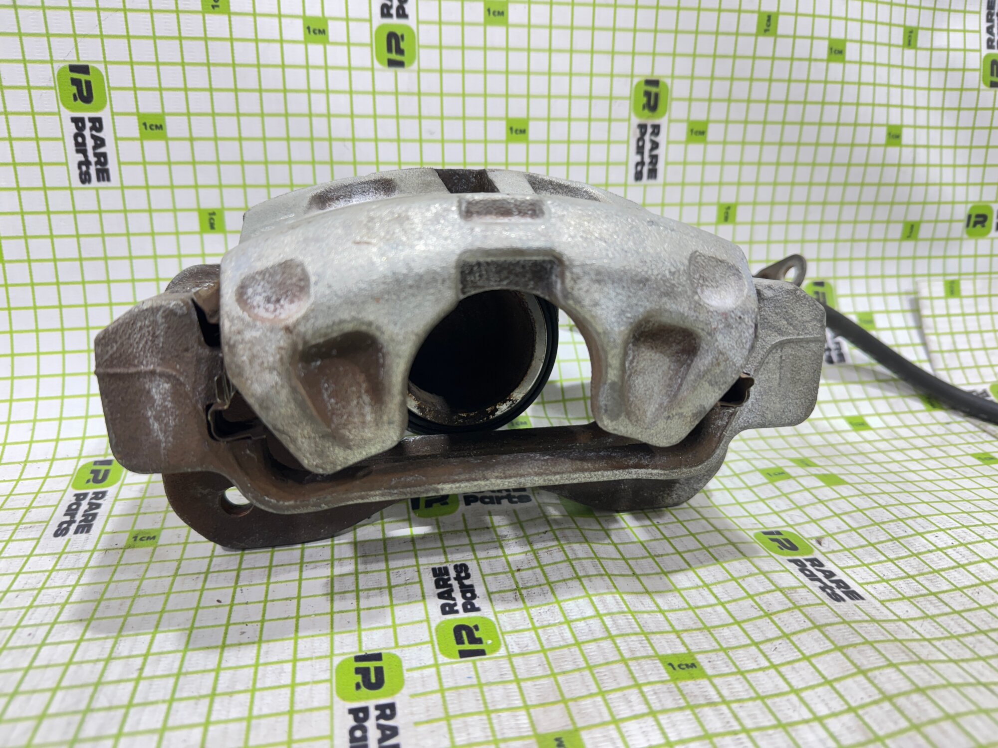 Суппорт тормозной передний левый для Toyota Camry