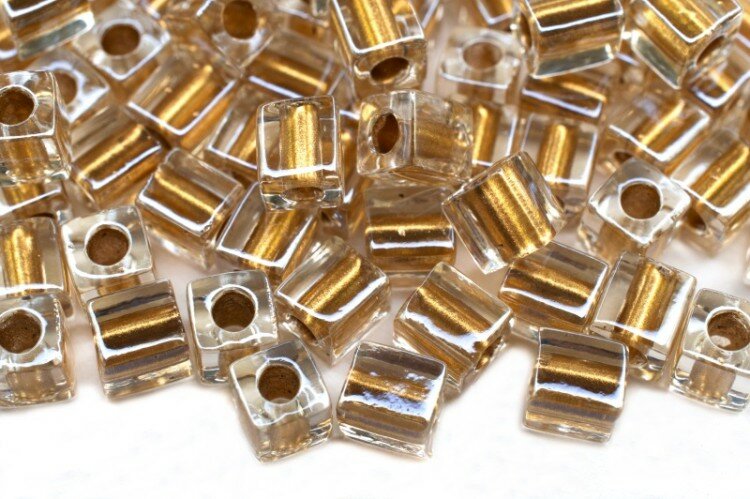 Бисер японский Miyuki Cube кубический 4мм #0234 хрусталь/золотой, окрашенный изнутри, 10 грамм