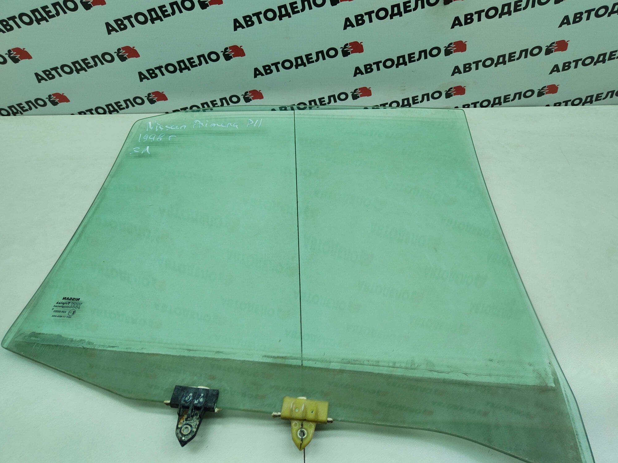 Стекло двери заднее левое Nissan Primera P11 1998