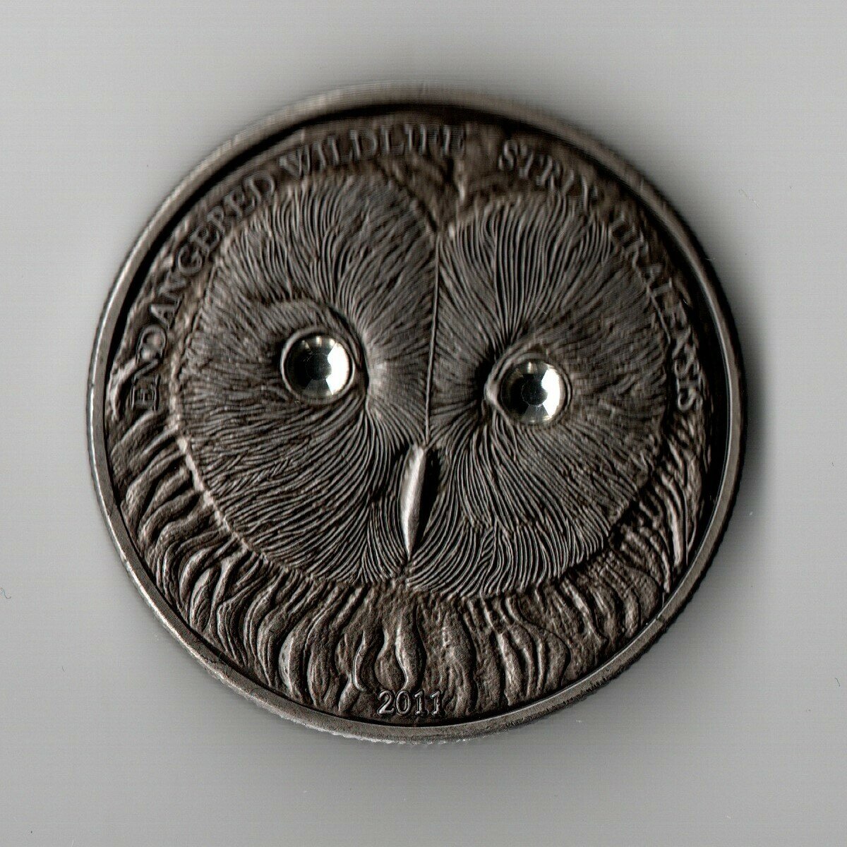 Жетон 500 тугриков 2011 года. Монголия. Сова посеребрение.