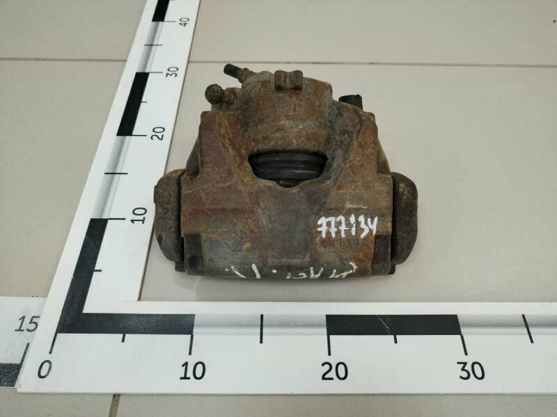 Суппорт передний правый Renault Duster 2012 кат.номер: 410018218R