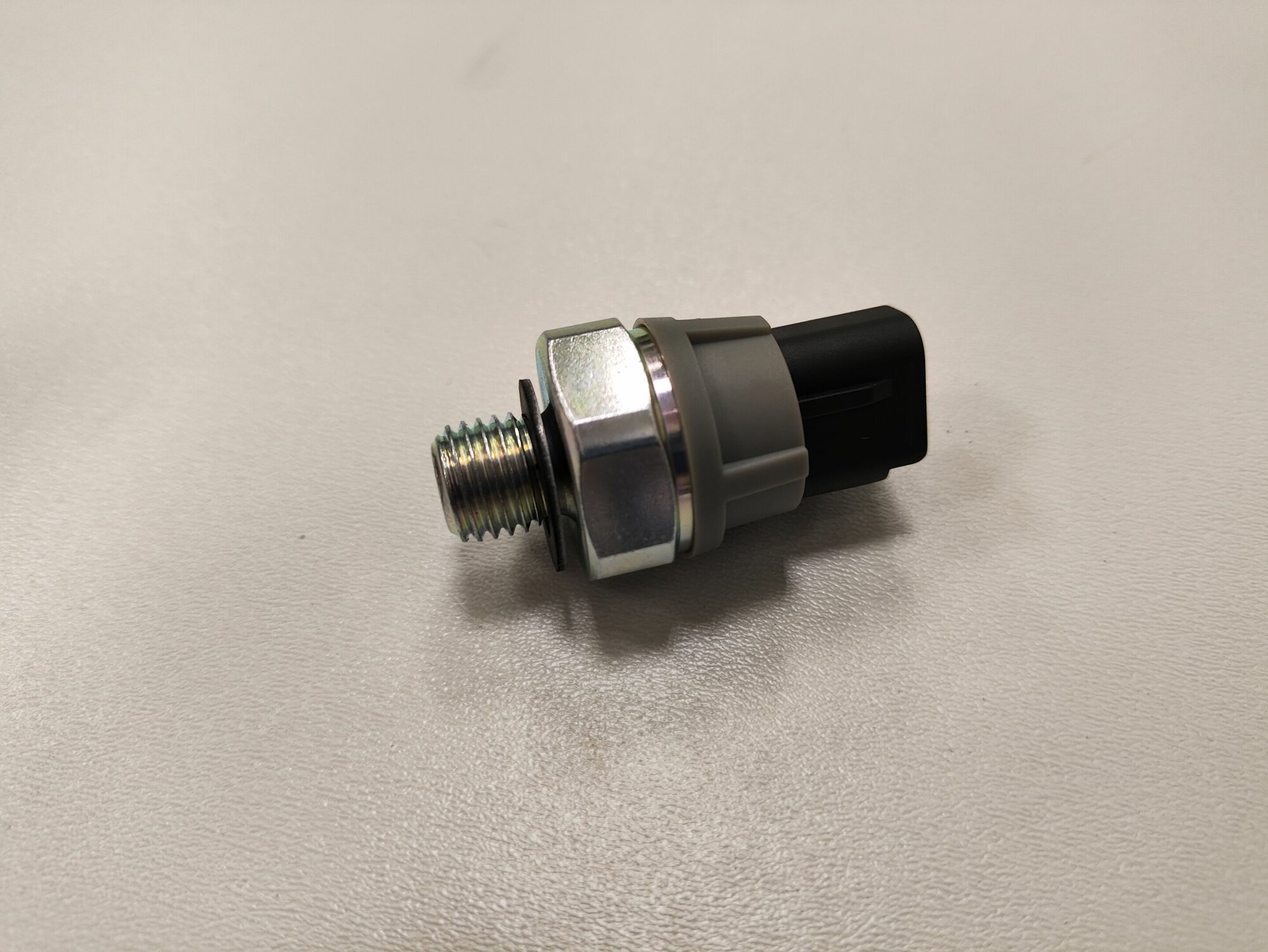 Датчик давления масла Geely Atlas Pro [1.5 12V 7AMT внедорожник 4X4] 1033531200