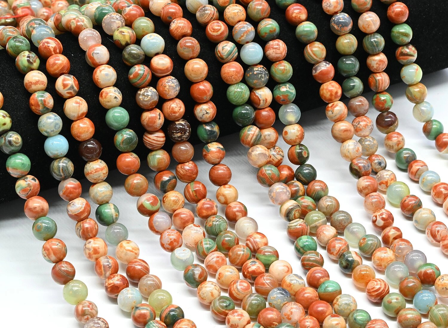 Бусины из агата тонированного шарик 8мм цв. рыже-зеленый, 37см, 49 бусин .