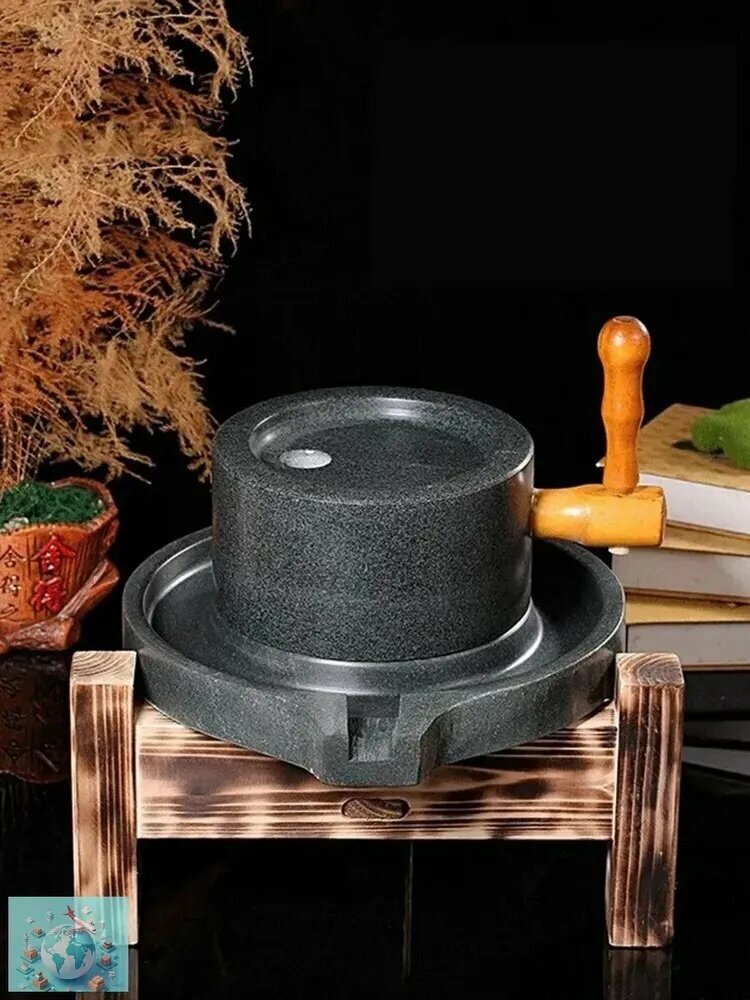 Мельница для помола зерна и круп с каменным жерновом