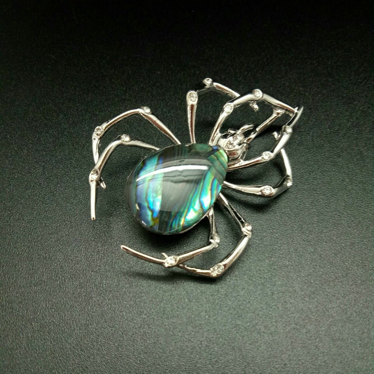 Брошь, гелиотис