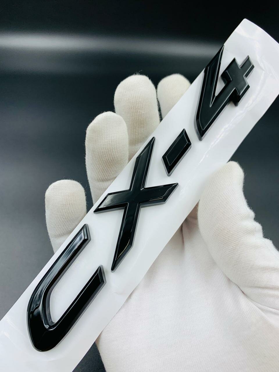 Значок эмблема Мазда CX-4. Шильдик на крышку багажника Mazda CX-4 (черный)