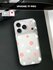 Чехол на Apple iPhone 17 Pro / Айфон 17 Про с принтом "Розовые и белые цветы", п...